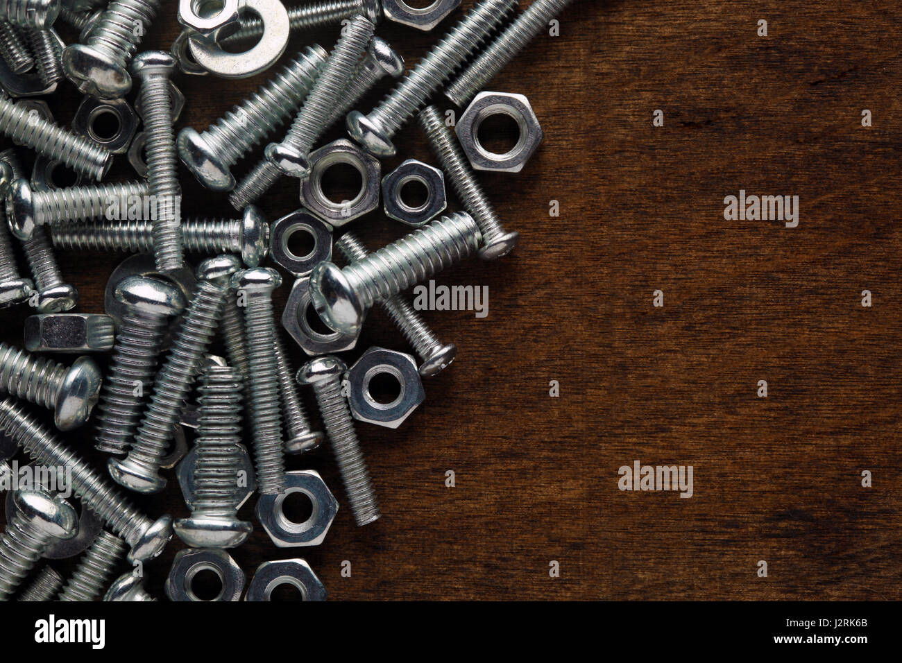 Nuts and bolts background Stock Photo - Alamy