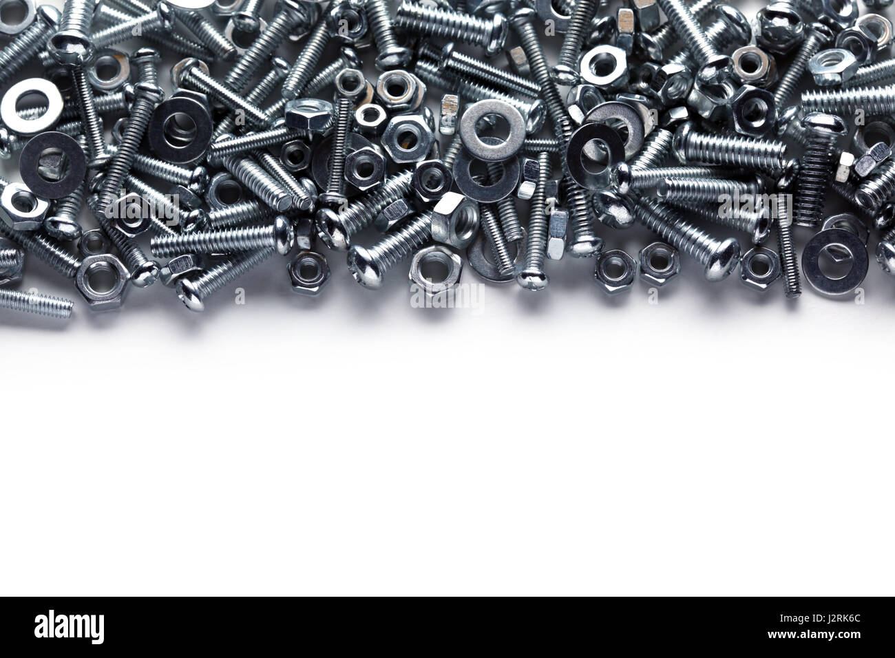 Nuts and bolts background Stock Photo - Alamy