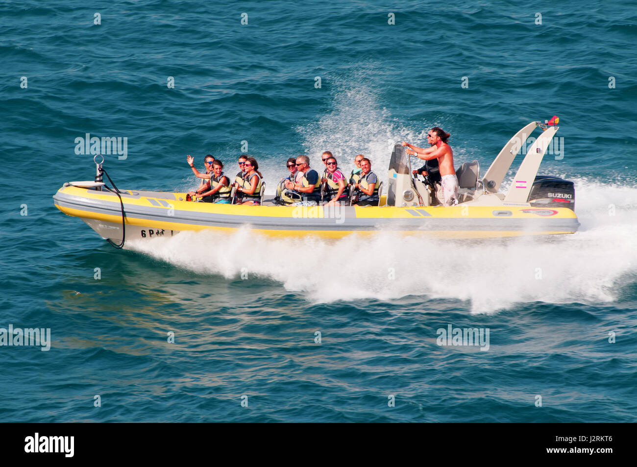 A rigid-hulled inflatable boat (RHIB), rigid-inflatable boat (RIB) is a ...