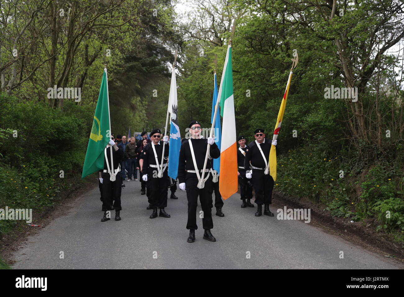 Marchers commemorating the 30th anniversary of the shooting dead of ...