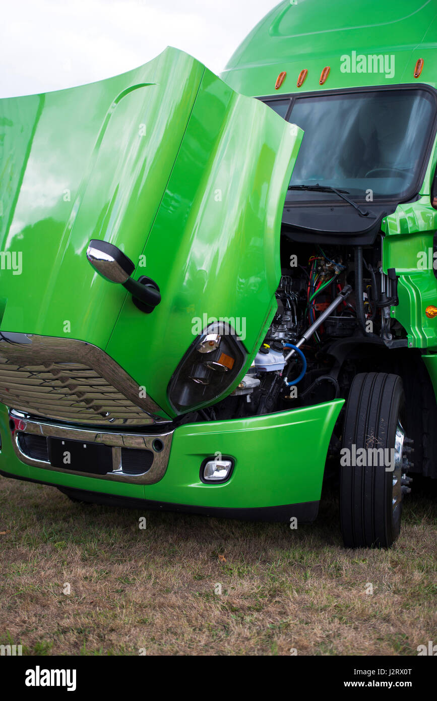 Huge professional bright shiny clean green big rig semi truck with an ...