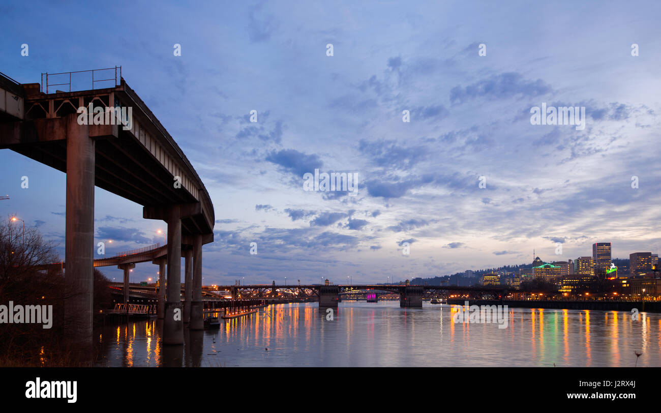 Panorama of the city at night with a semi-circle rotation overpass ...