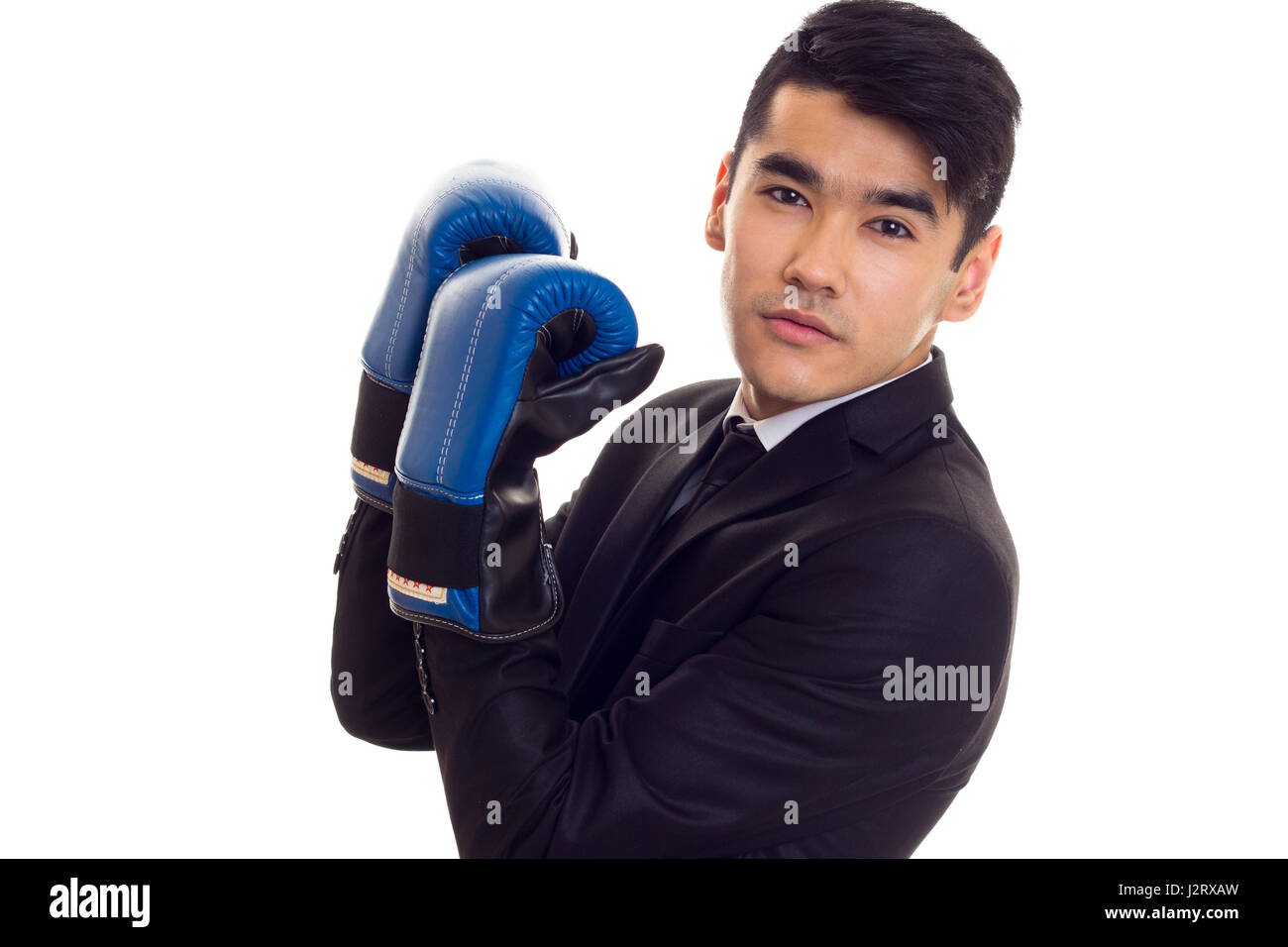 Young man in suit with boxing gloves Stock Photo - Alamy