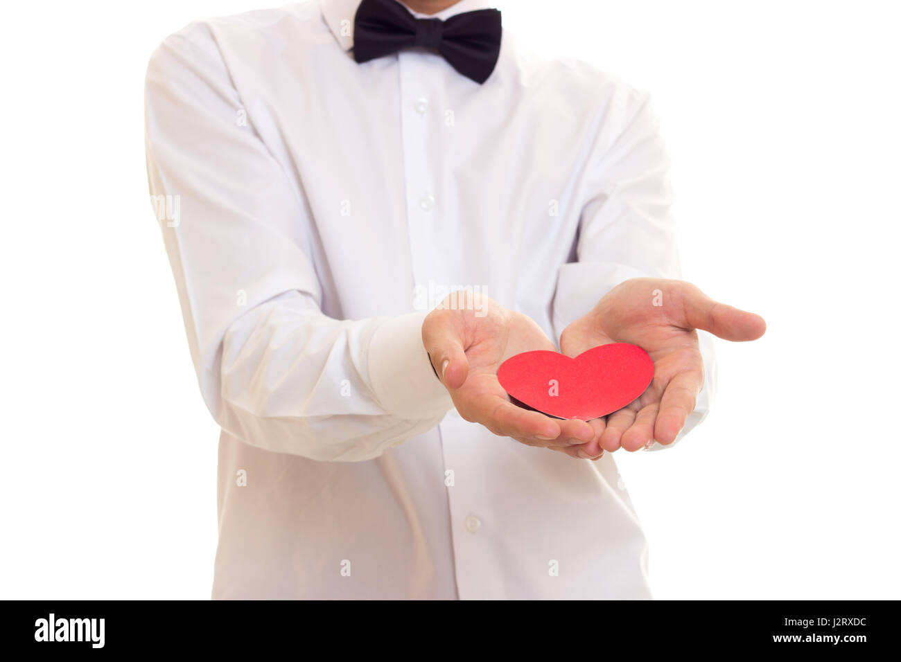 Young man holding a read heart Stock Photo - Alamy
