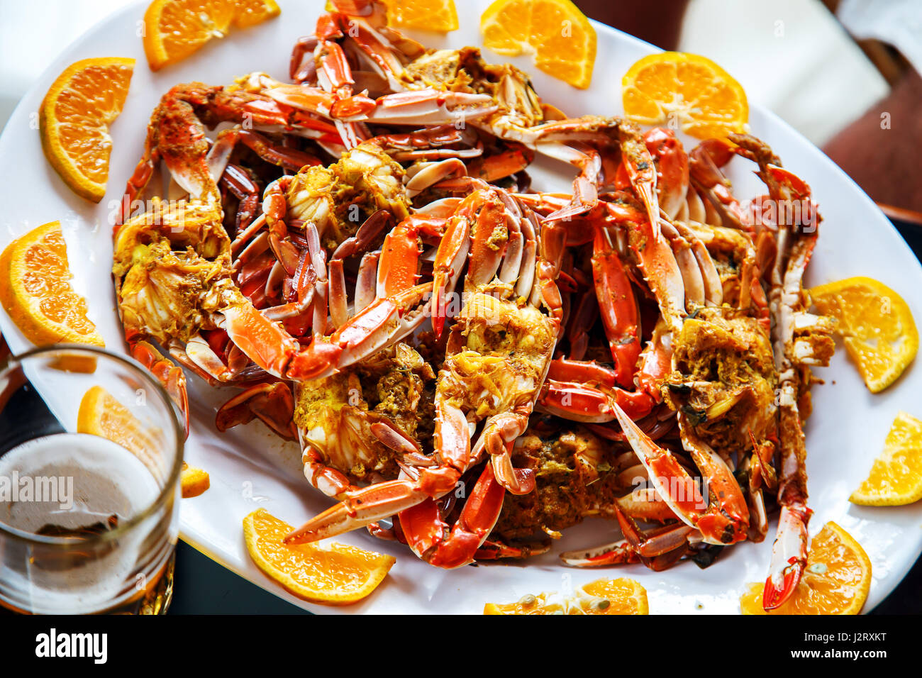 Delicious cooked crabs on a plate. Asian cuisine Stock Photo - Alamy