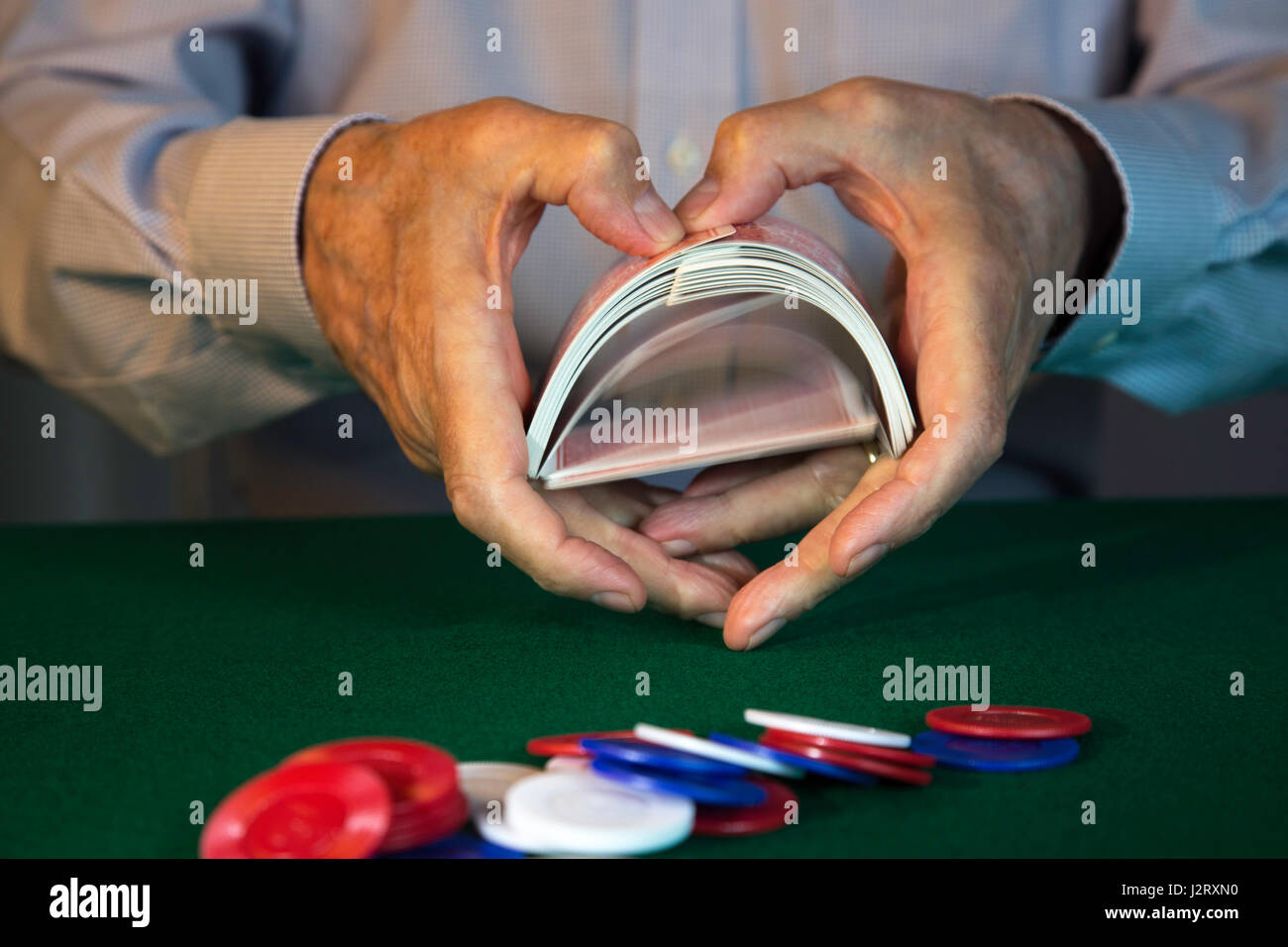 man Shuffling Cards Dealing at Poker Game Stock Photo - Alamy
