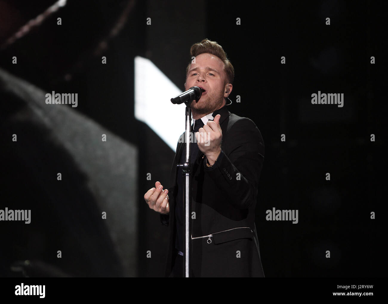 Olly Murs performs on stage during his first night at the O2 Arena in ...