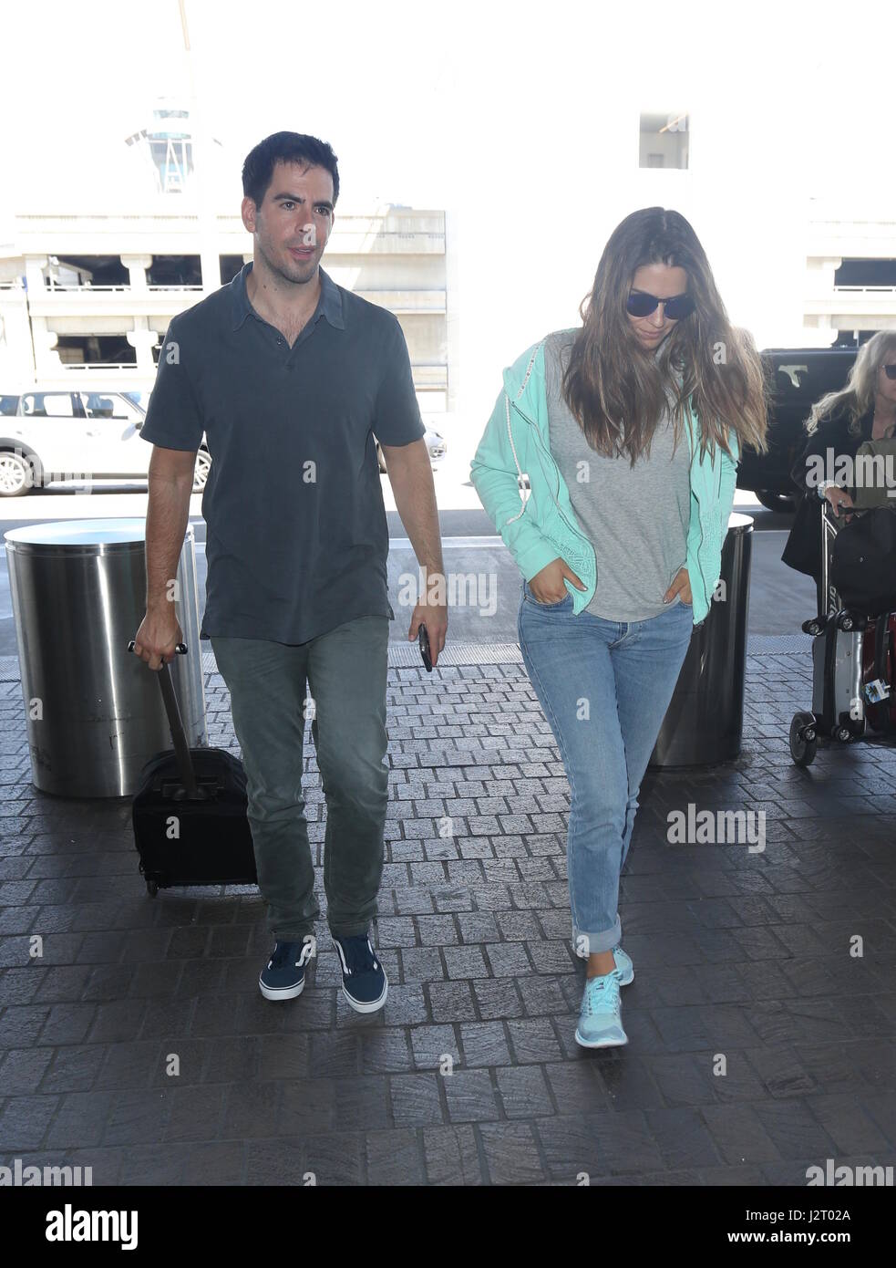 Eli Roth departs from the airport with his wife Lorenza Featuring: Eli ...