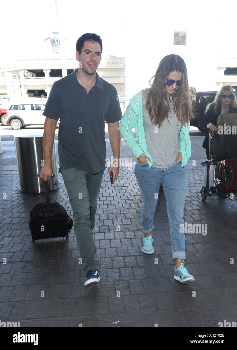 Eli Roth departs from the airport with his wife Lorenza Featuring: Eli ...