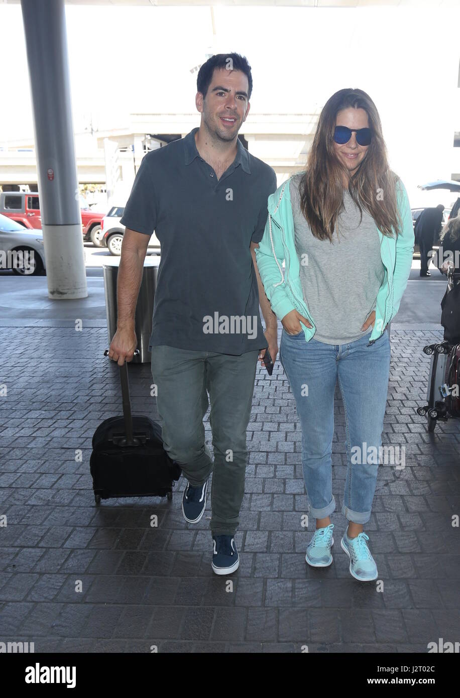 Eli Roth departs from the airport with his wife Lorenza Featuring: Eli ...