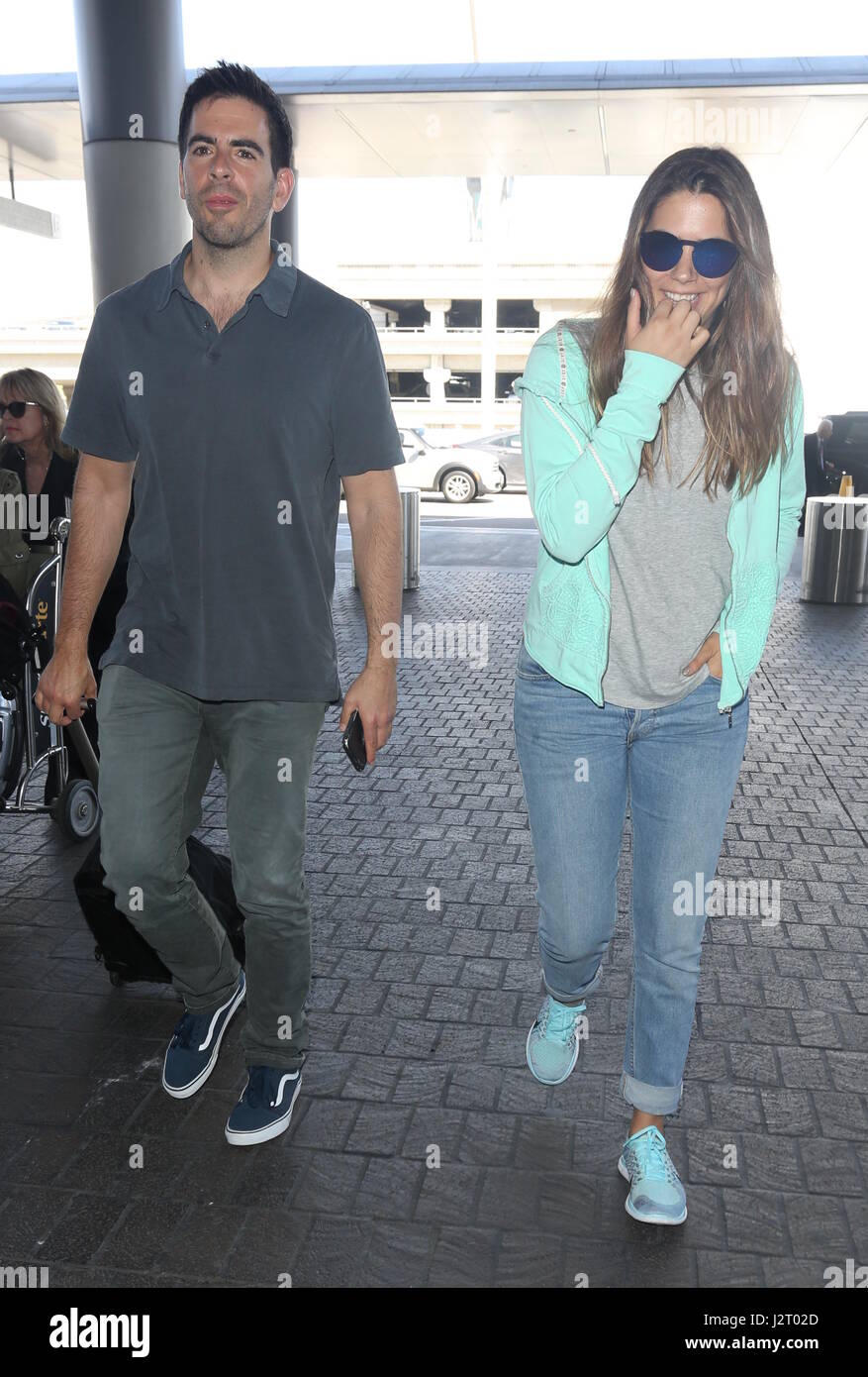 Eli Roth departs from the airport with his wife Lorenza Featuring: Eli ...