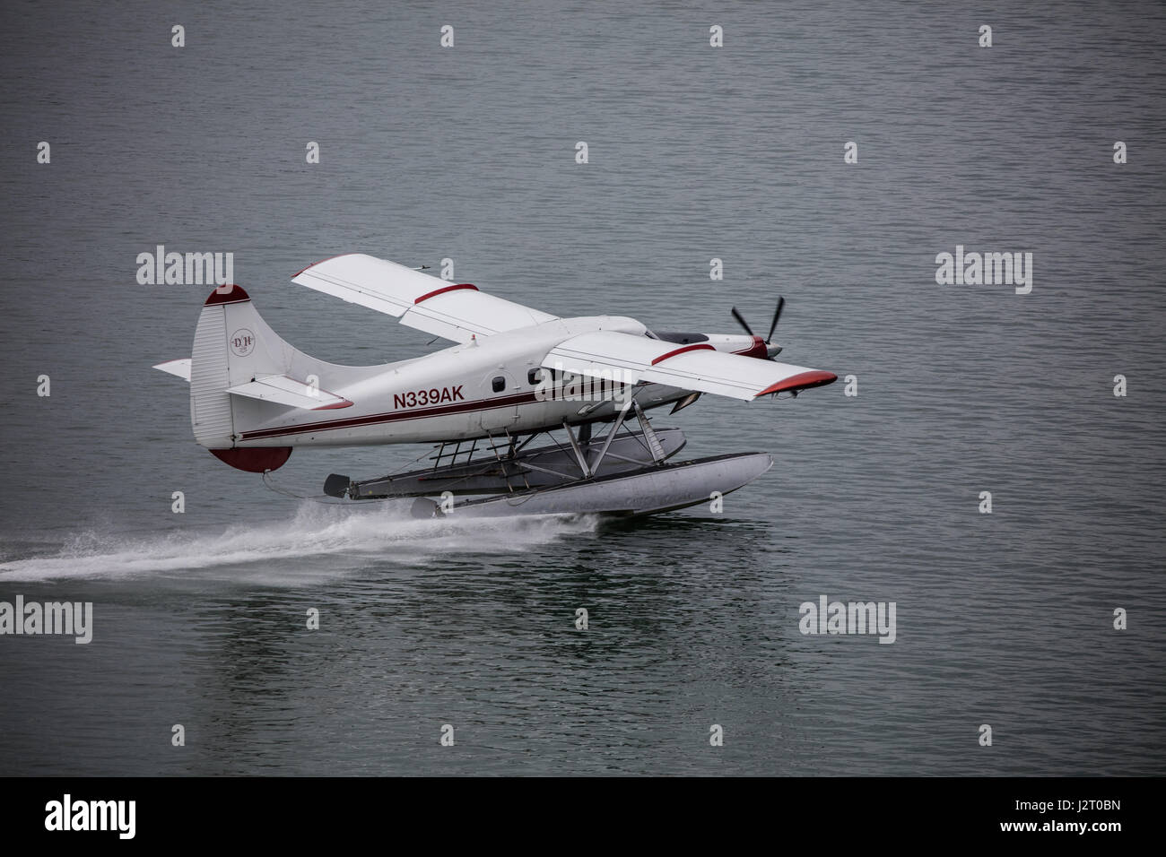 Seaplane landing in the harbor at Juneau, Alaska Stock Photo - Alamy
