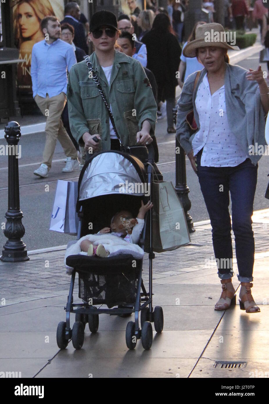 Chrissy Teigen out and about with her daughter Featuring: Chrissy ...