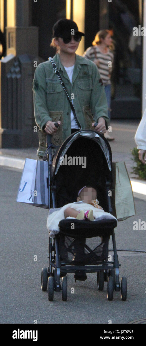 Chrissy Teigen out and about with her daughter Featuring: Chrissy ...