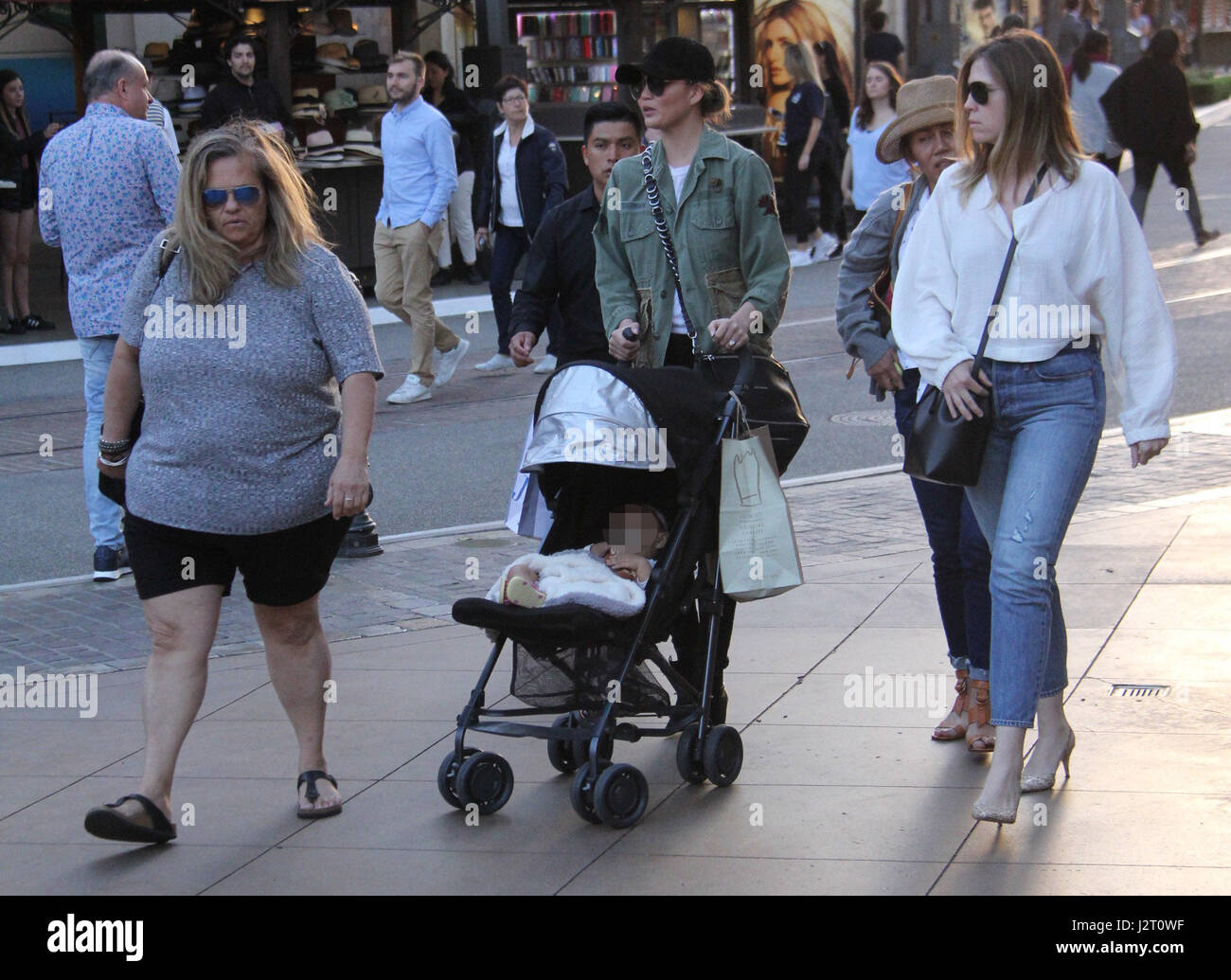 Chrissy Teigen out and about with her daughter Featuring: Chrissy ...