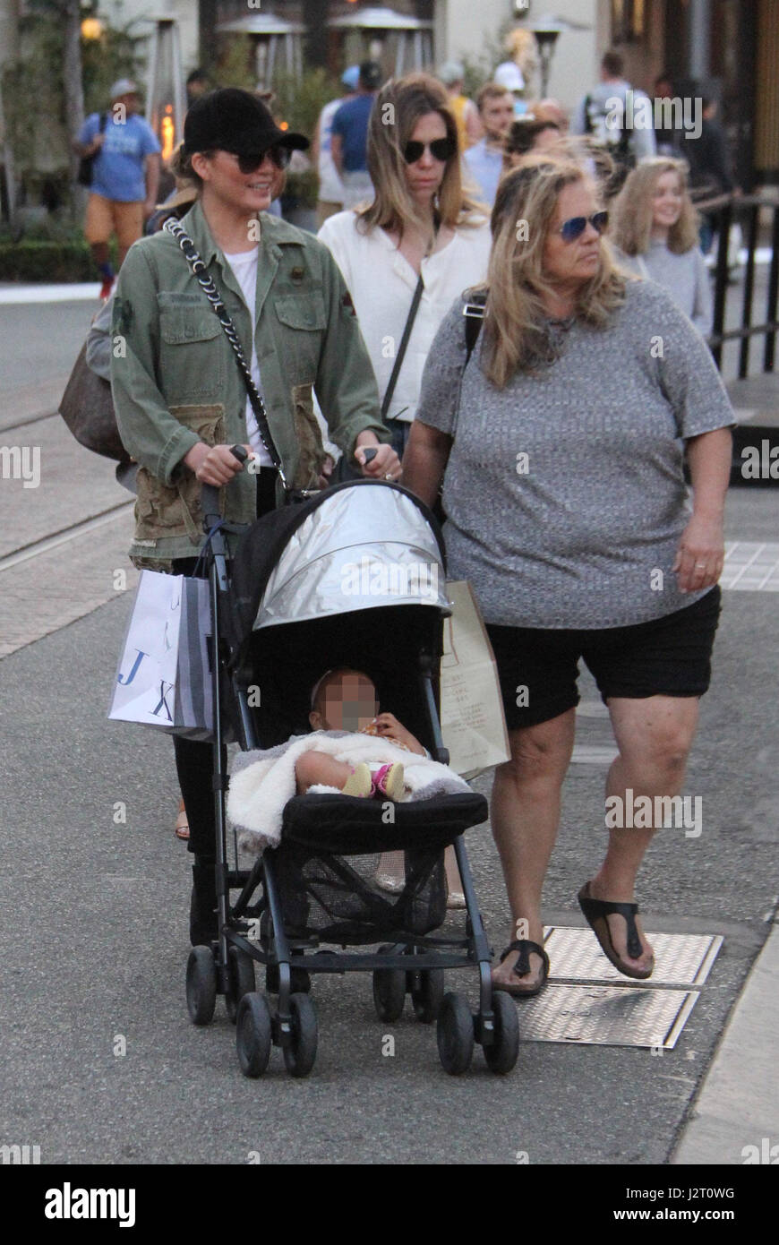 Chrissy Teigen out and about with her daughter Featuring: Chrissy ...