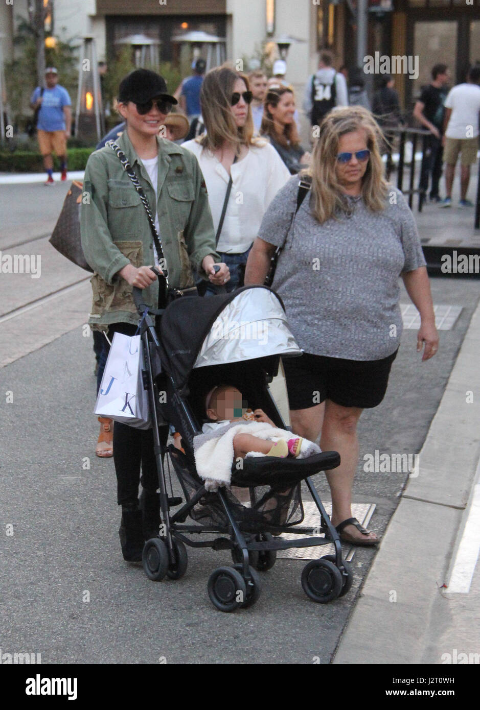 Chrissy Teigen out and about with her daughter Featuring: Chrissy ...