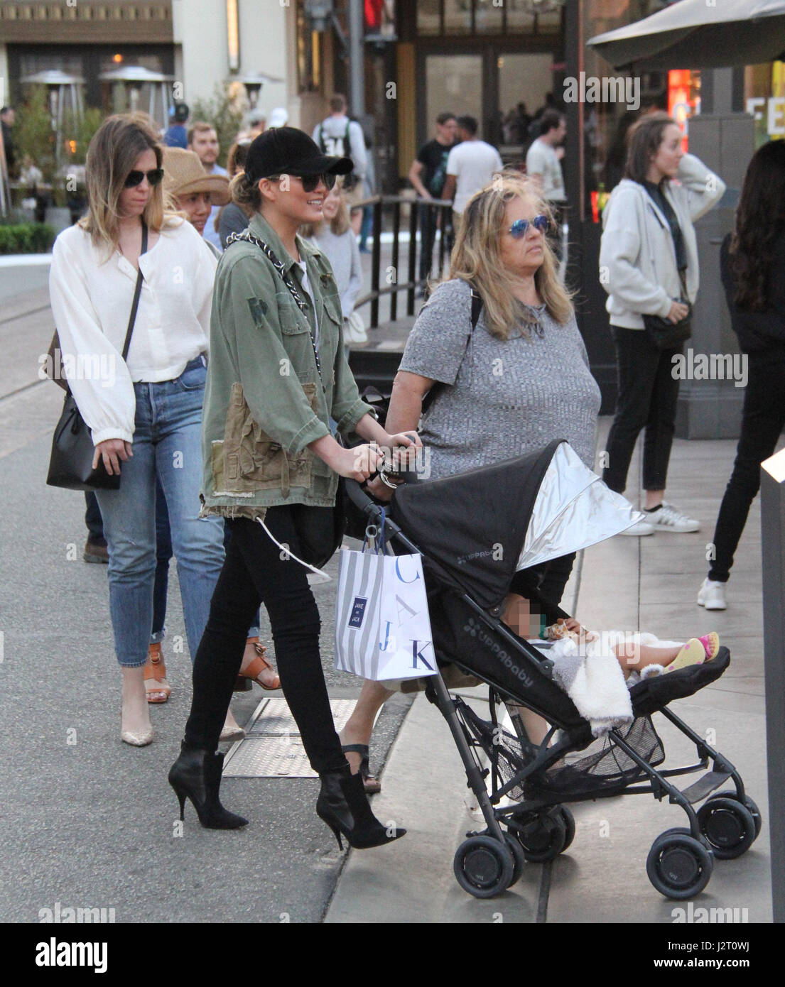 Chrissy Teigen out and about with her daughter Featuring: Chrissy ...