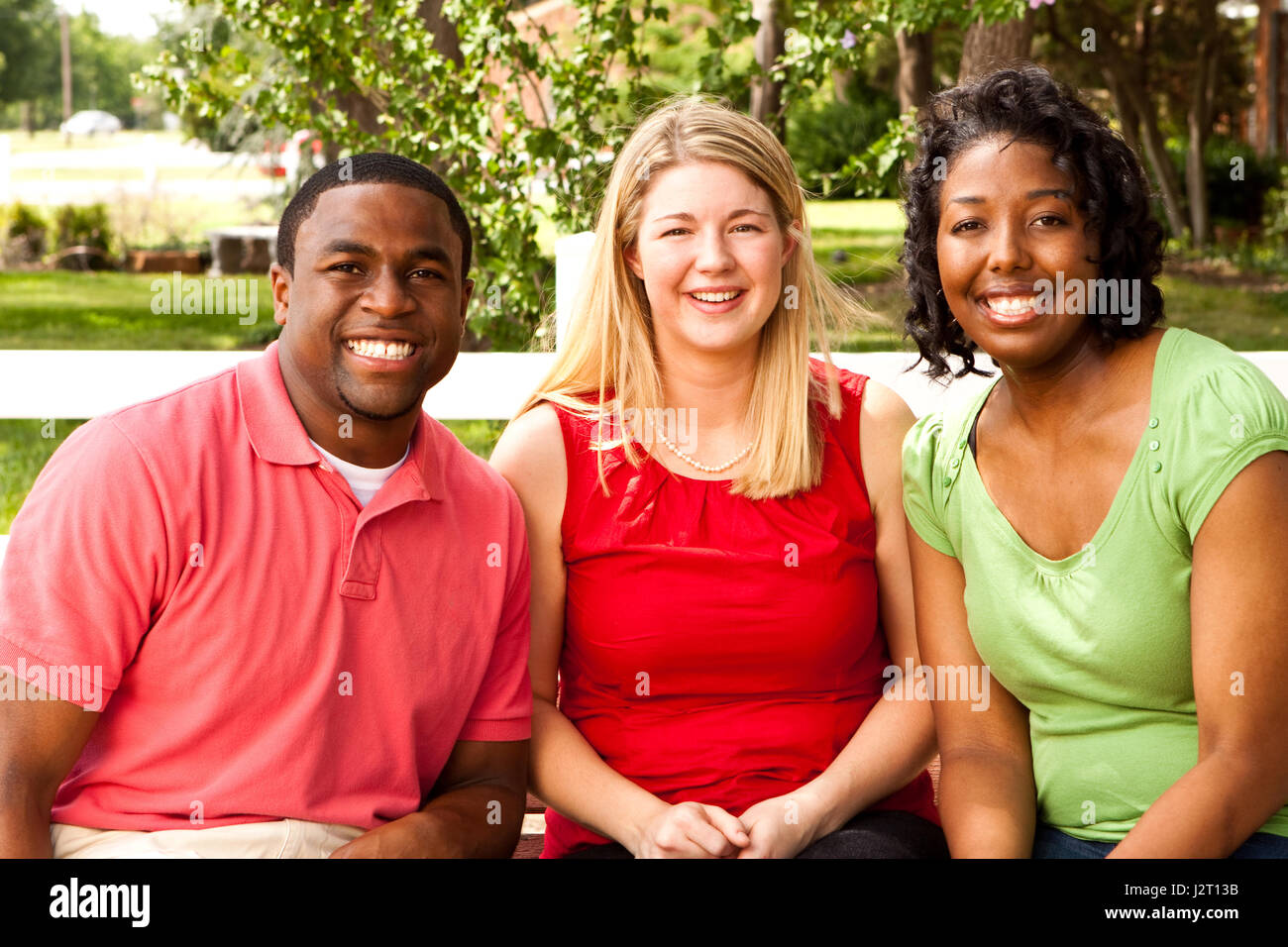 Diverse group of people talking and laughing Stock Photo - Alamy