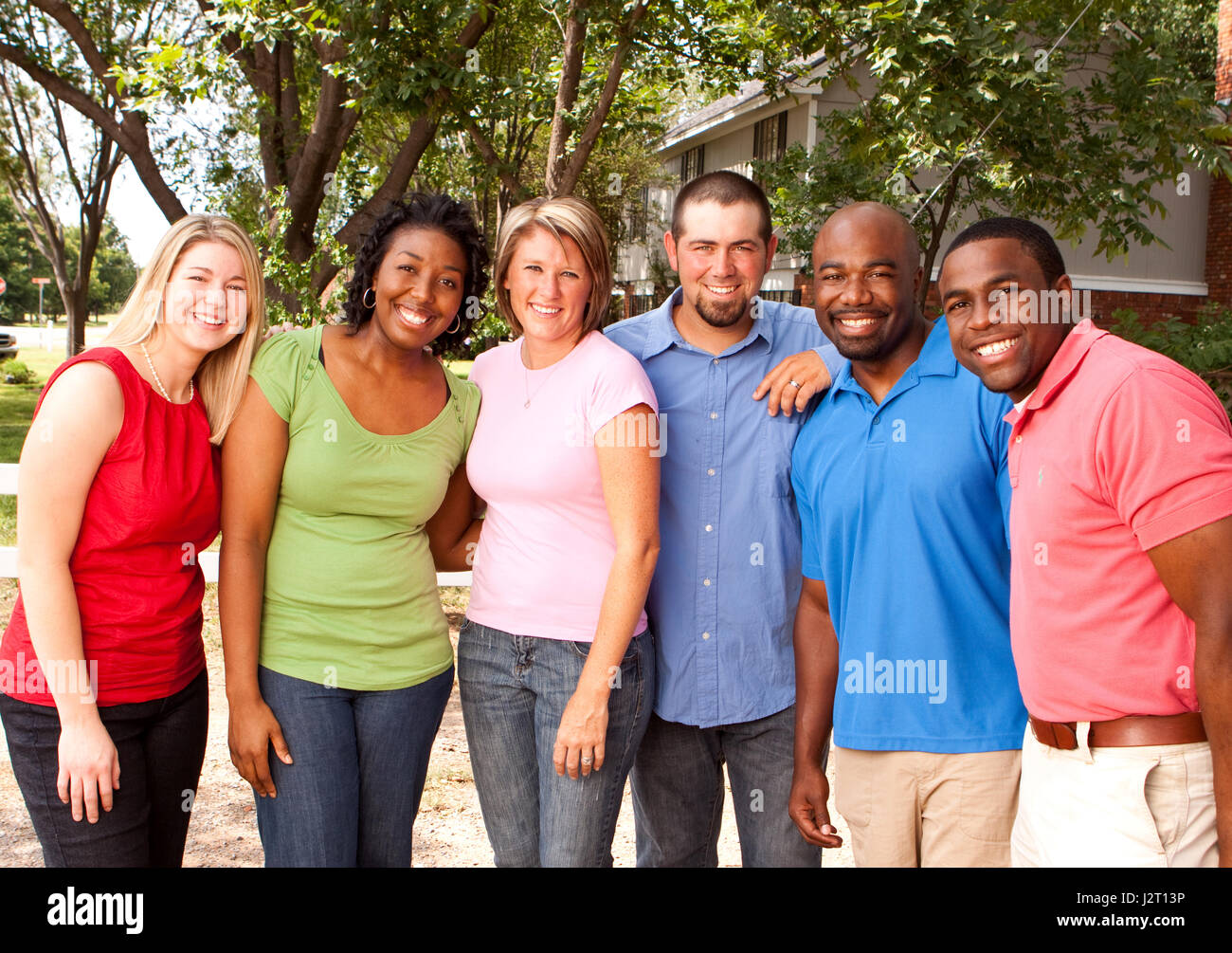 Diverse group of people talking and laughing Stock Photo - Alamy