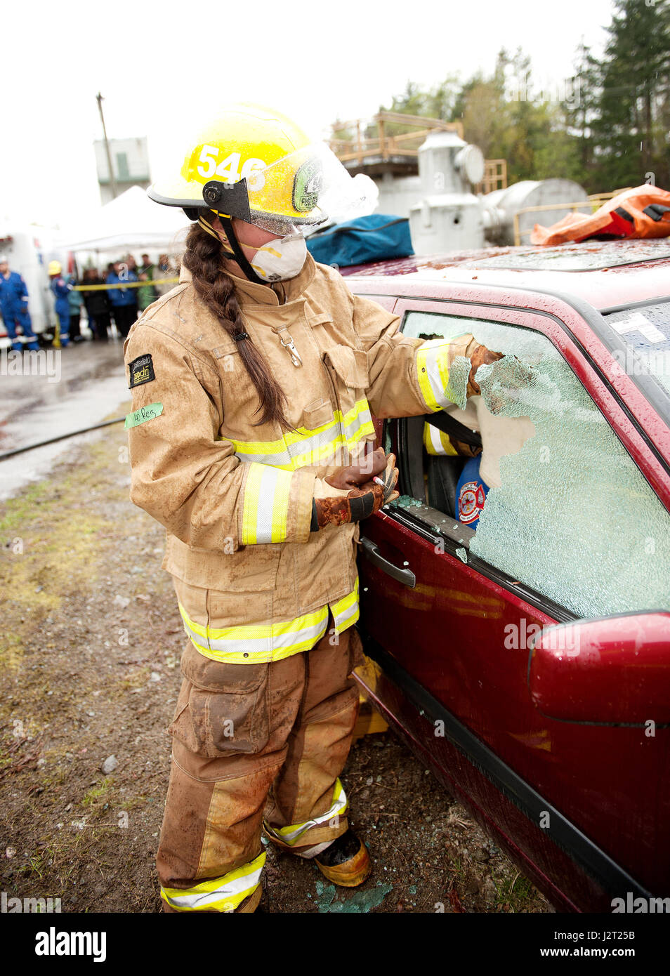 Trainee fire fighter and Howe Sound Secondary student Kei Gray works on ...