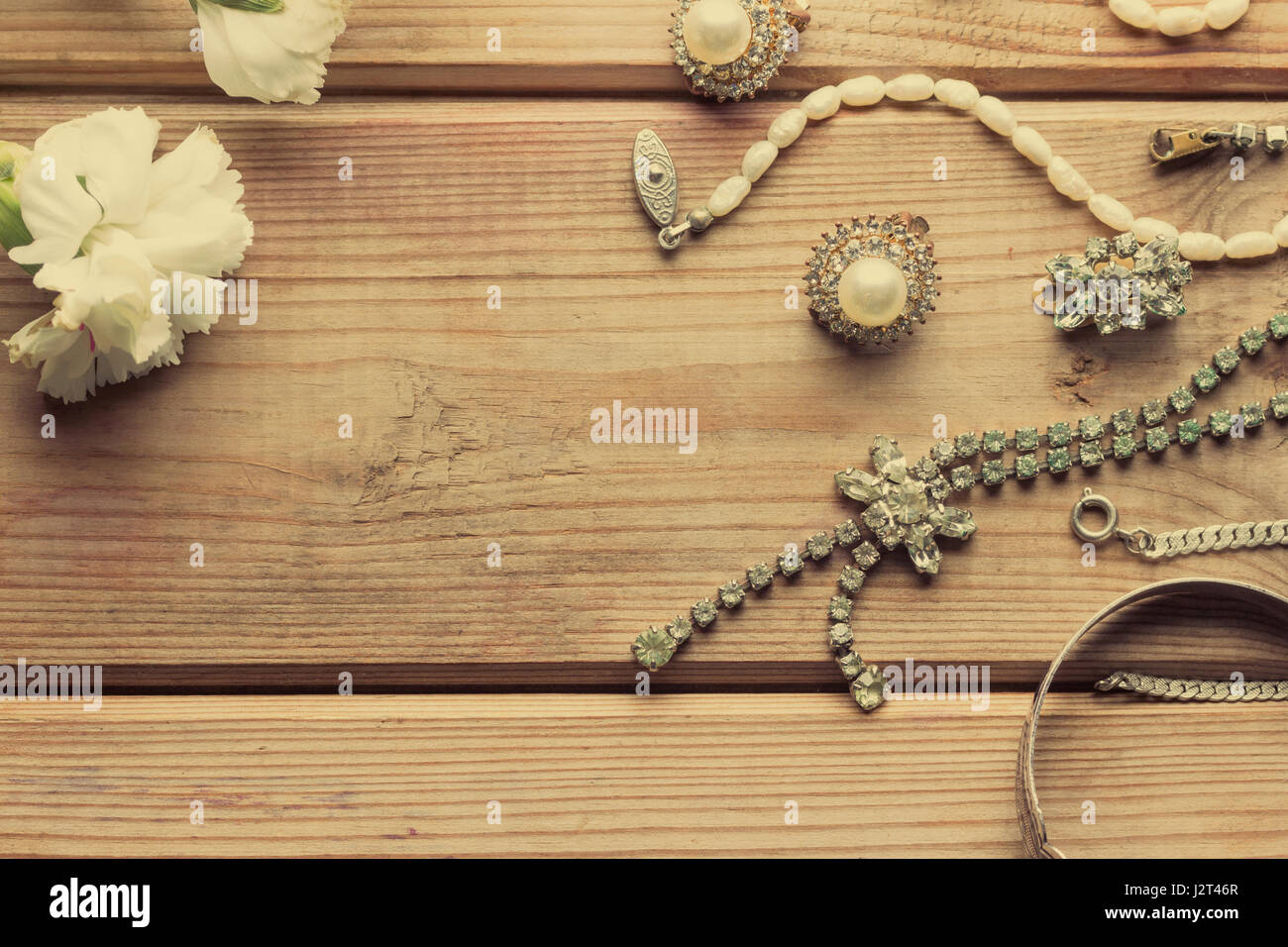 antique vintage silver jewellery on wooden table Stock Photo - Alamy