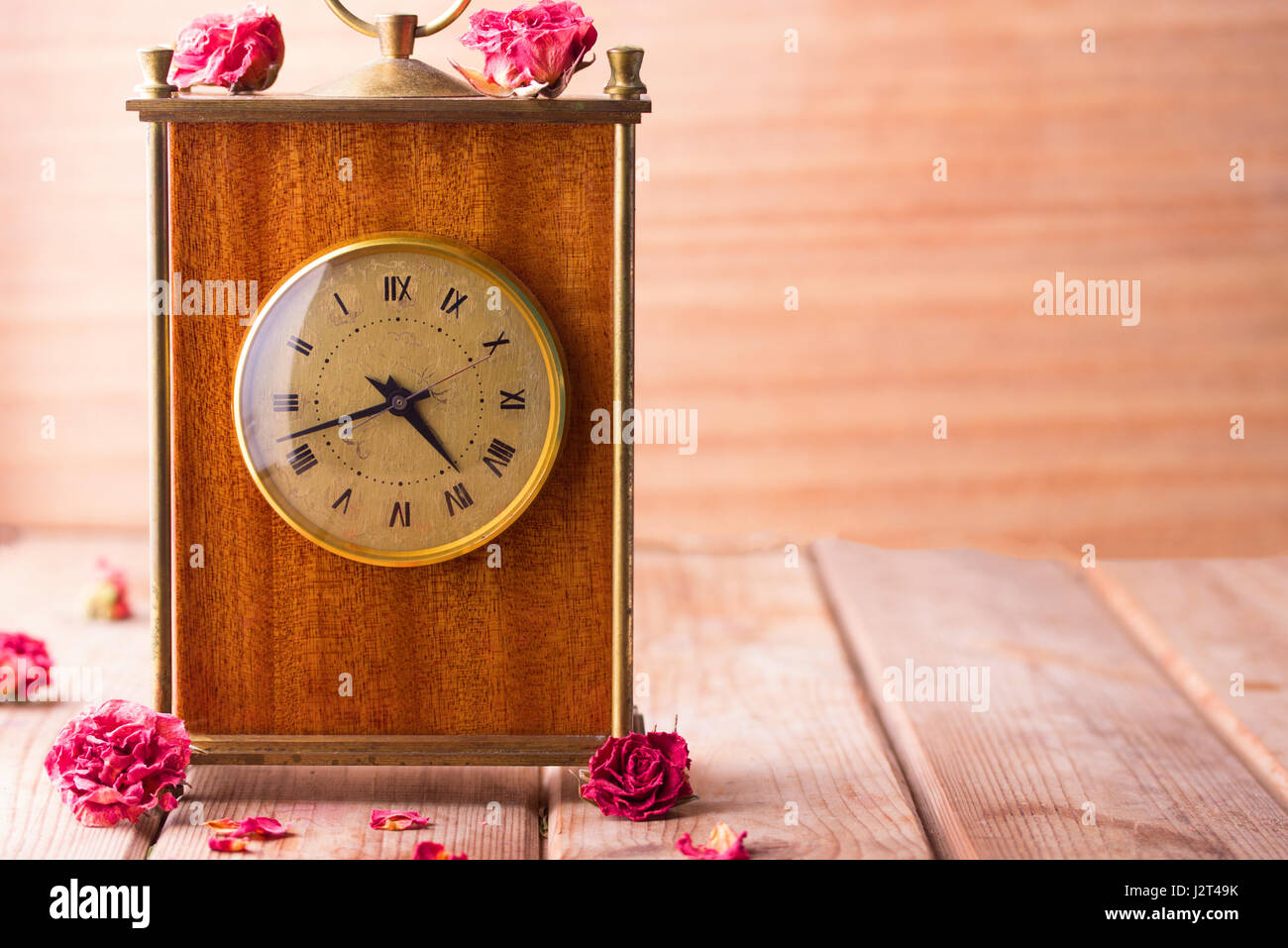vintage style picture of an arrangement with a bouquet of roses, an ...