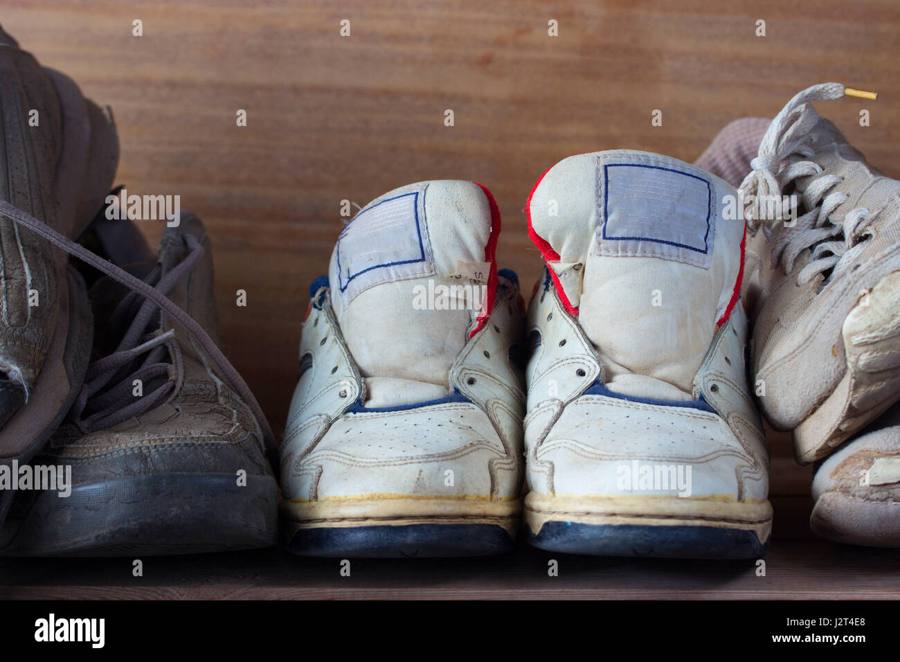 front view from the pairs of old boots Stock Photo - Alamy