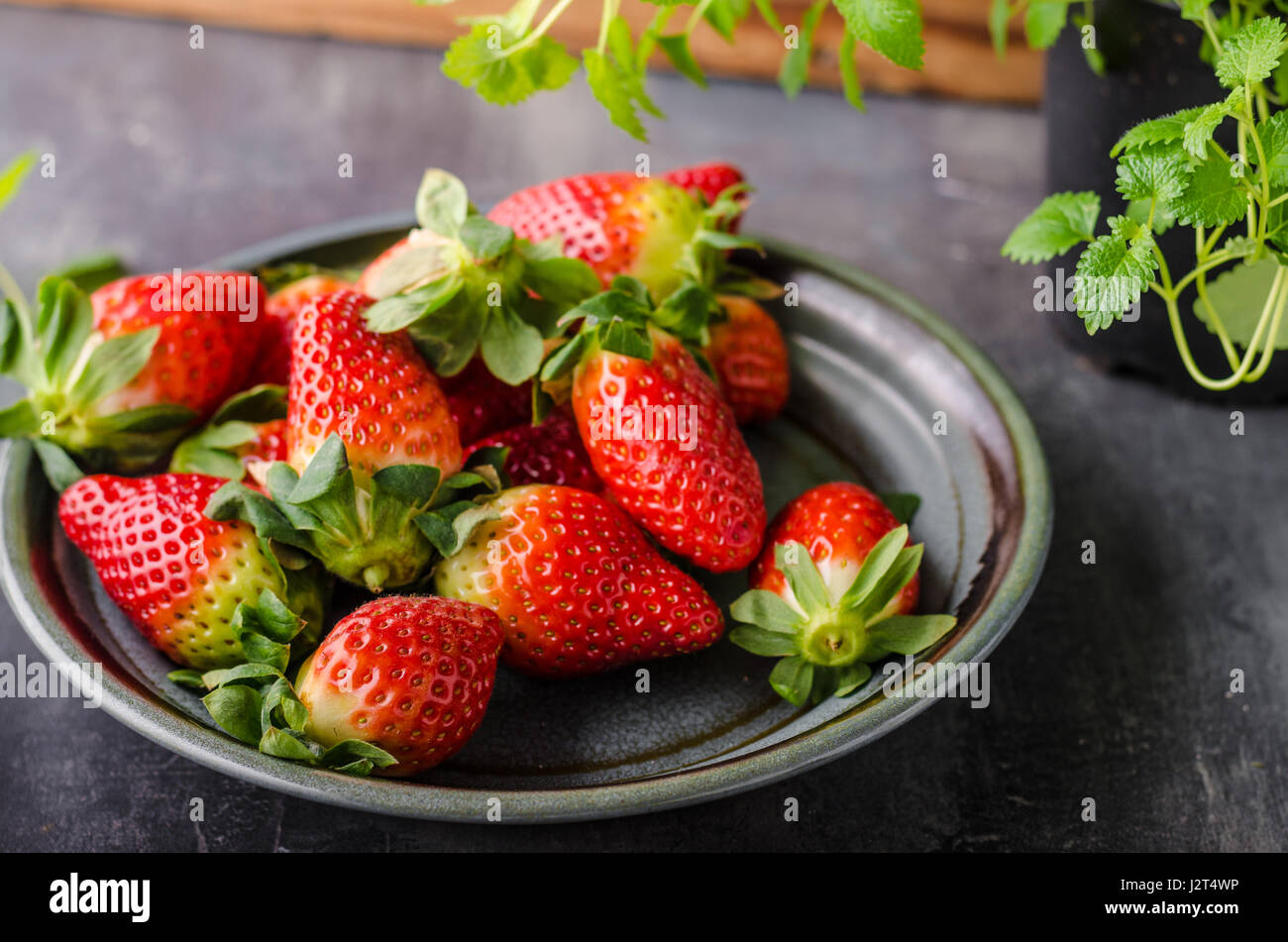 Strawberries fresh pick up, food styling, food photography Stock Photo ...