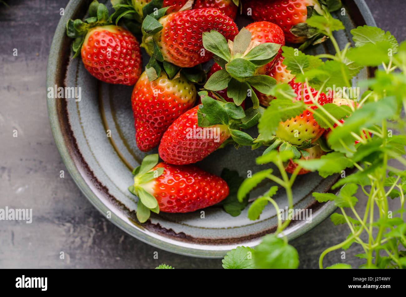 Strawberries fresh pick up, food styling, food photography Stock Photo ...