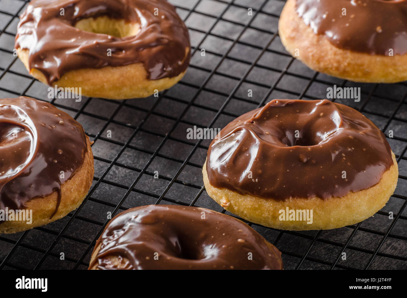 Chocolate glazed donut topped hi-res stock photography and images - Alamy