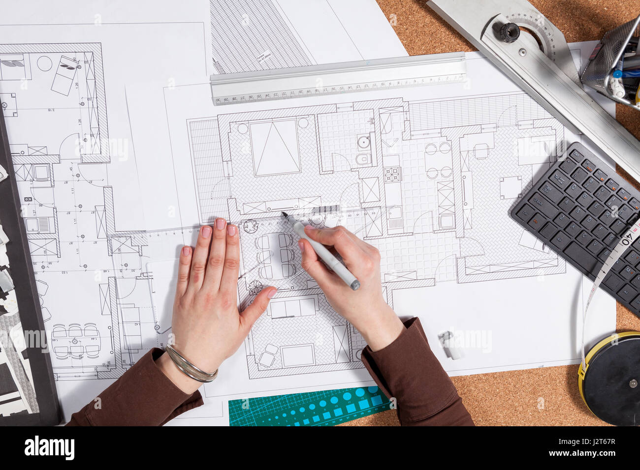 Close up of architect desk with blueprints Stock Photo - Alamy