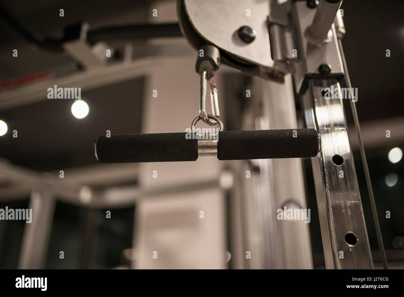 Detail from pulling exercise machine in the gym Stock Photo - Alamy
