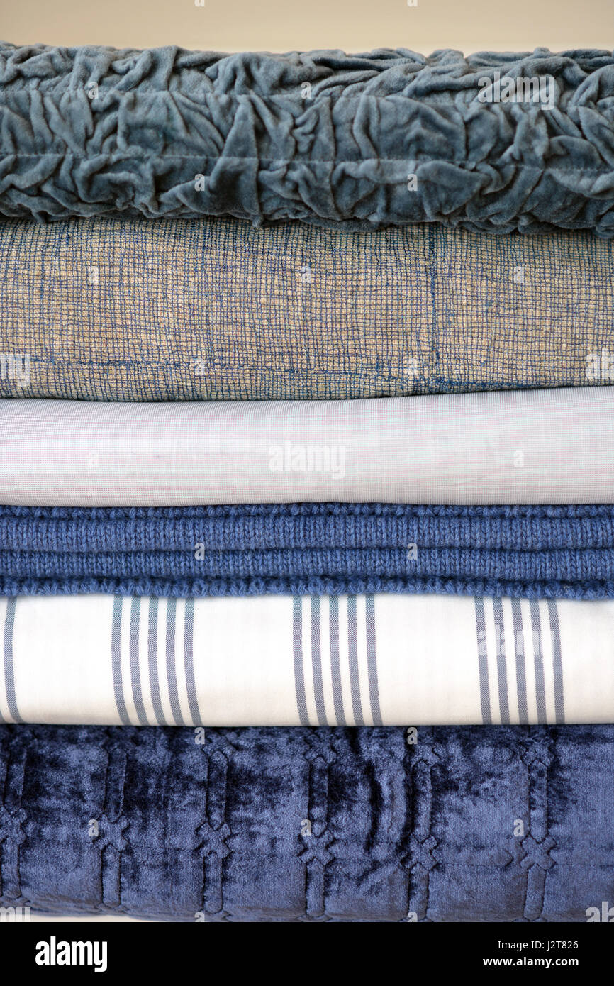 Pile of folded and textured bedding Stock Photo - Alamy