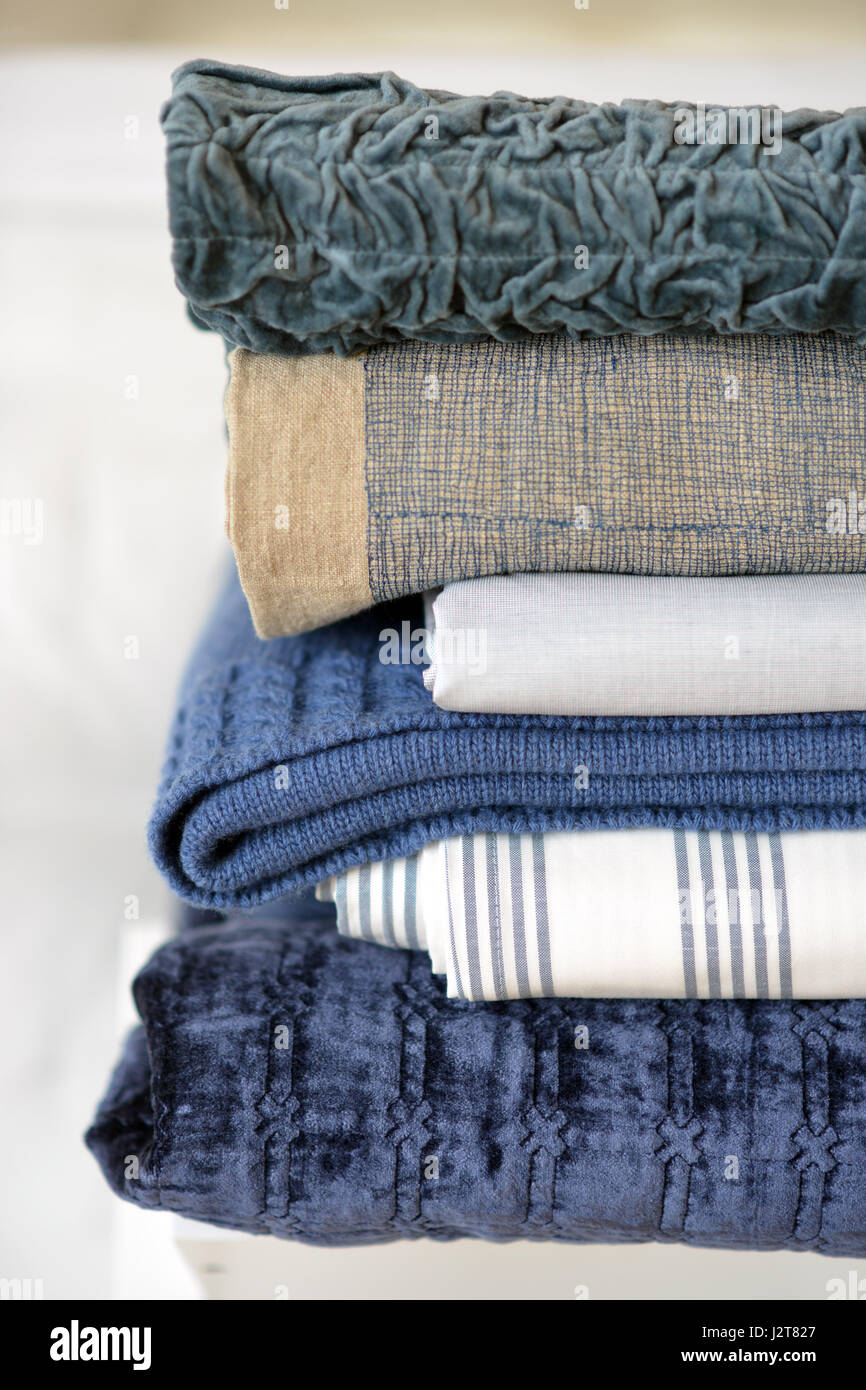 Pile of folded and textured bedding Stock Photo - Alamy