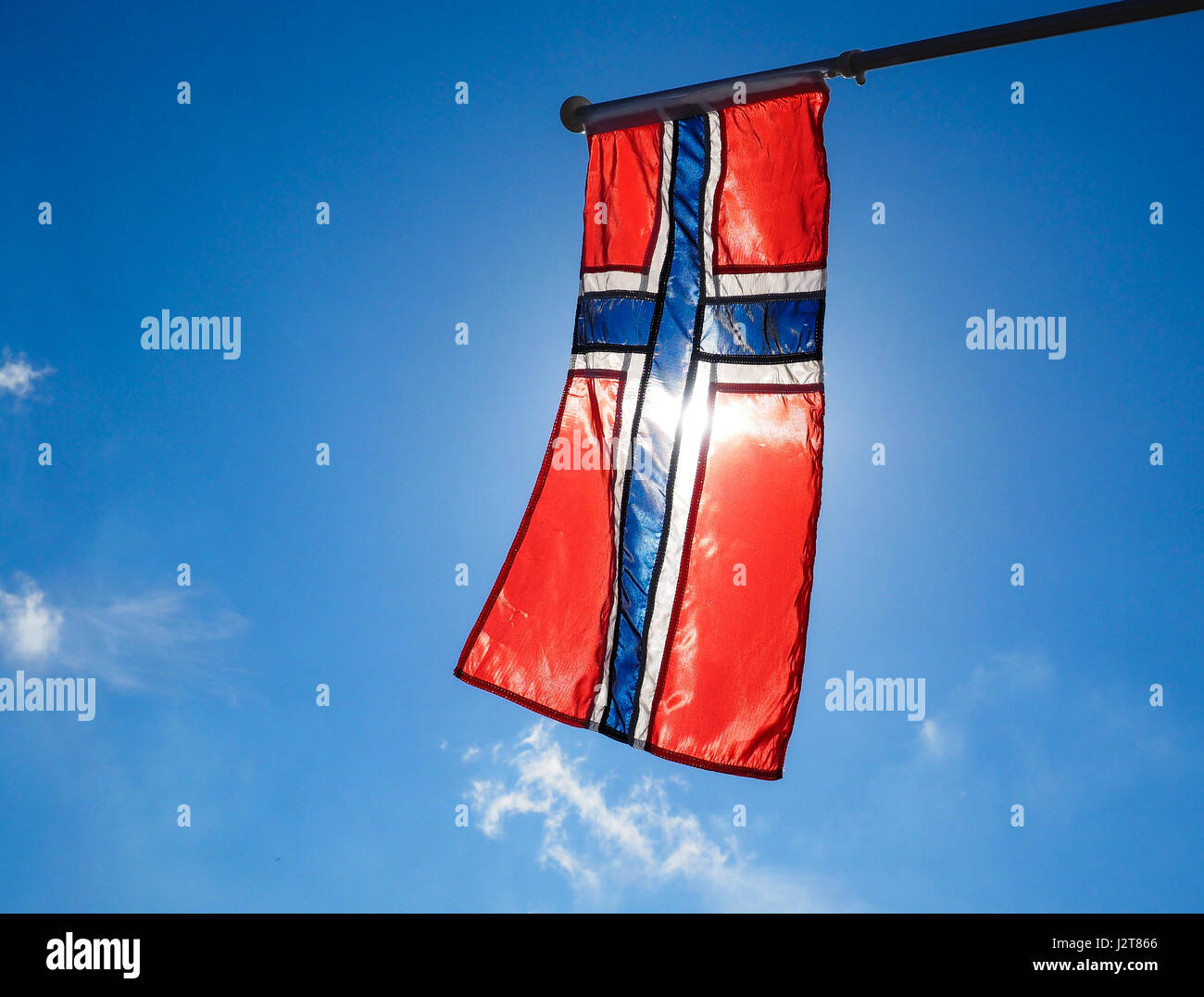 Norwegian flag up close, towards the sun on beautiful blue sky Stock ...