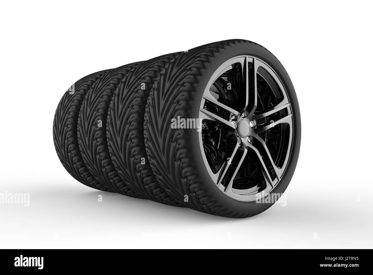 Four tires formation isolated on a white background Stock Photo - Alamy