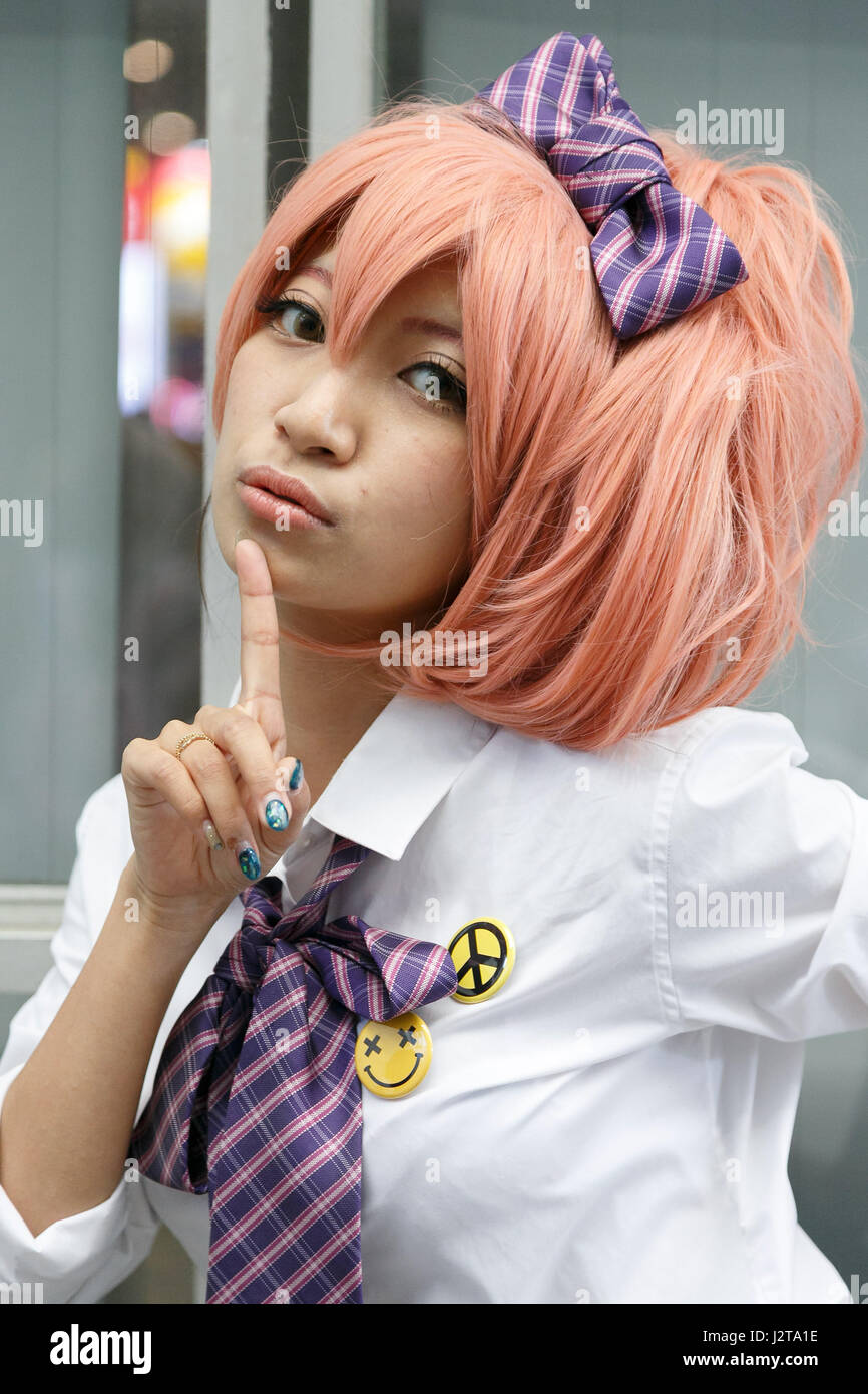 Chiba, Japan. 30th Apr, 2017. A cosplayer poses for a photograph during ...