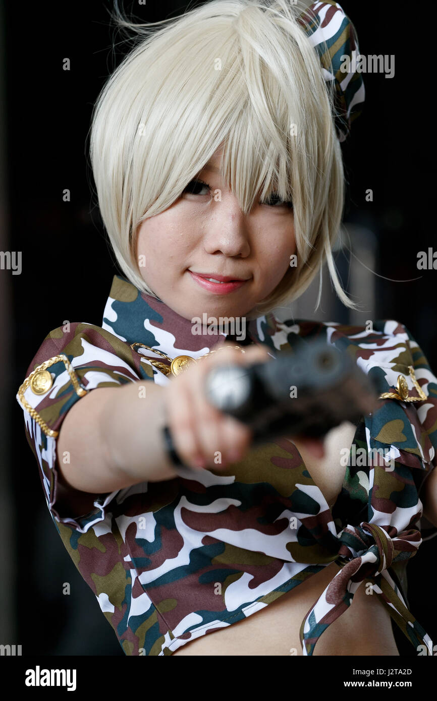 Chiba, Japan. 30th Apr, 2017. A cosplayer poses for a photograph during ...