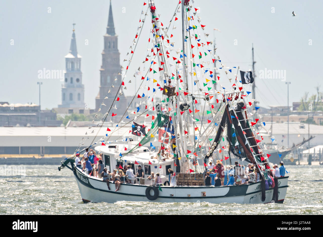 Charleston, USA. 30th Apr, 2017. A decorated shrimp boat parades down ...