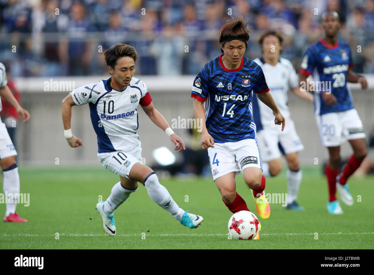 Kanagawa, Japan. 30th Apr, 2017. (L to R) Shu Kurata (Gamba), Jun Amano (F Marinos), April 30 ...
