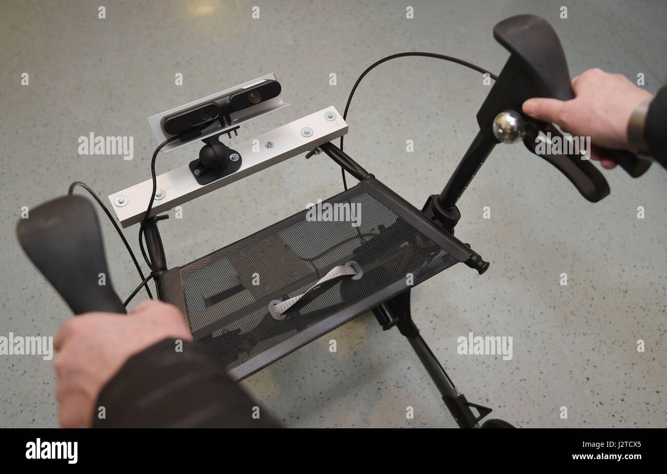 Bremen, Germany. 26th Apr, 2017. A woman pushes a test model of a ...