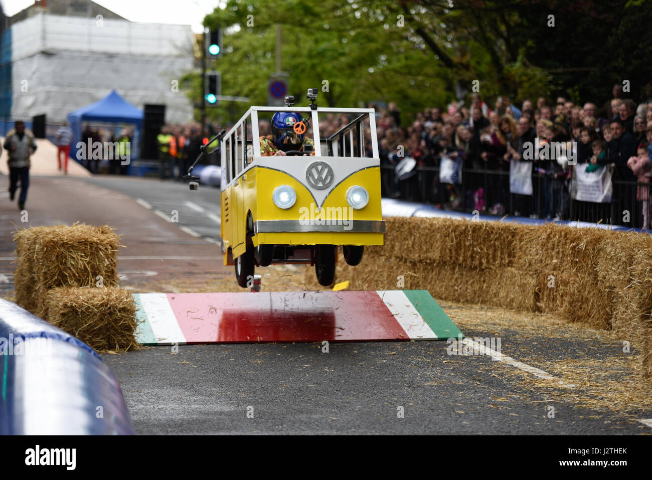 Soapbox, or soap box, derby carts leap over the jump ramps during an ...