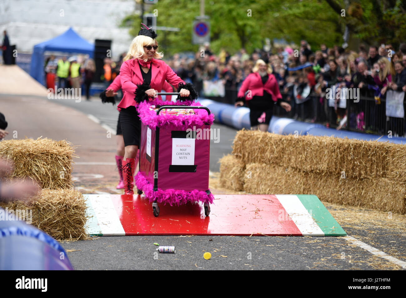 Soapbox, or soap box, derby carts leap over the jump ramps during an ...