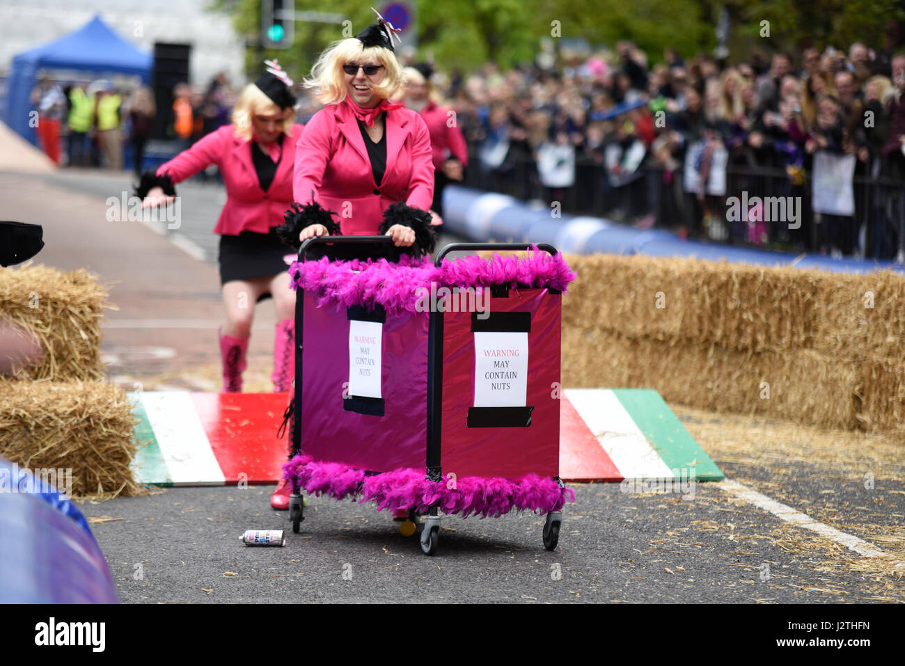 Soapbox, or soap box, derby carts leap over the jump ramps during an ...