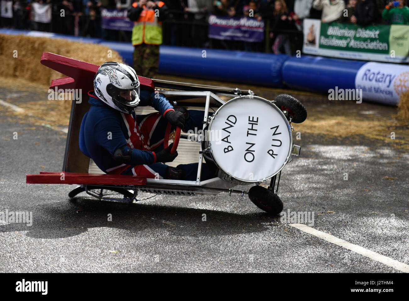 Soapbox, or soap box, derby carts leap over the jump ramps during an ...