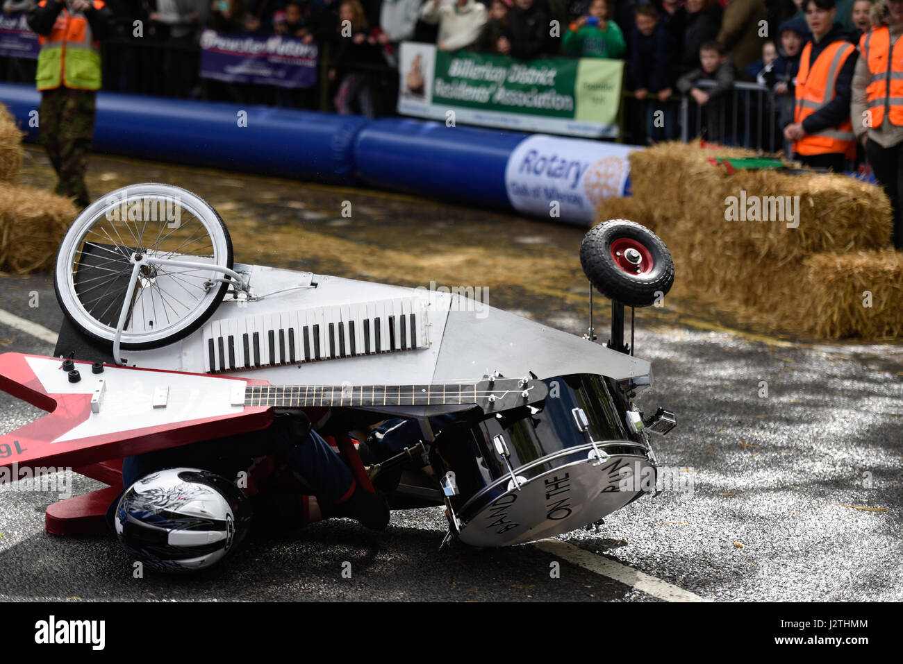 Soapbox, or soap box, derby carts leap over the jump ramps during an ...