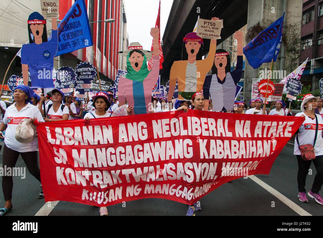 Manila, Metro Manila, Philippines. 1st May, 2017. Women activists march ...