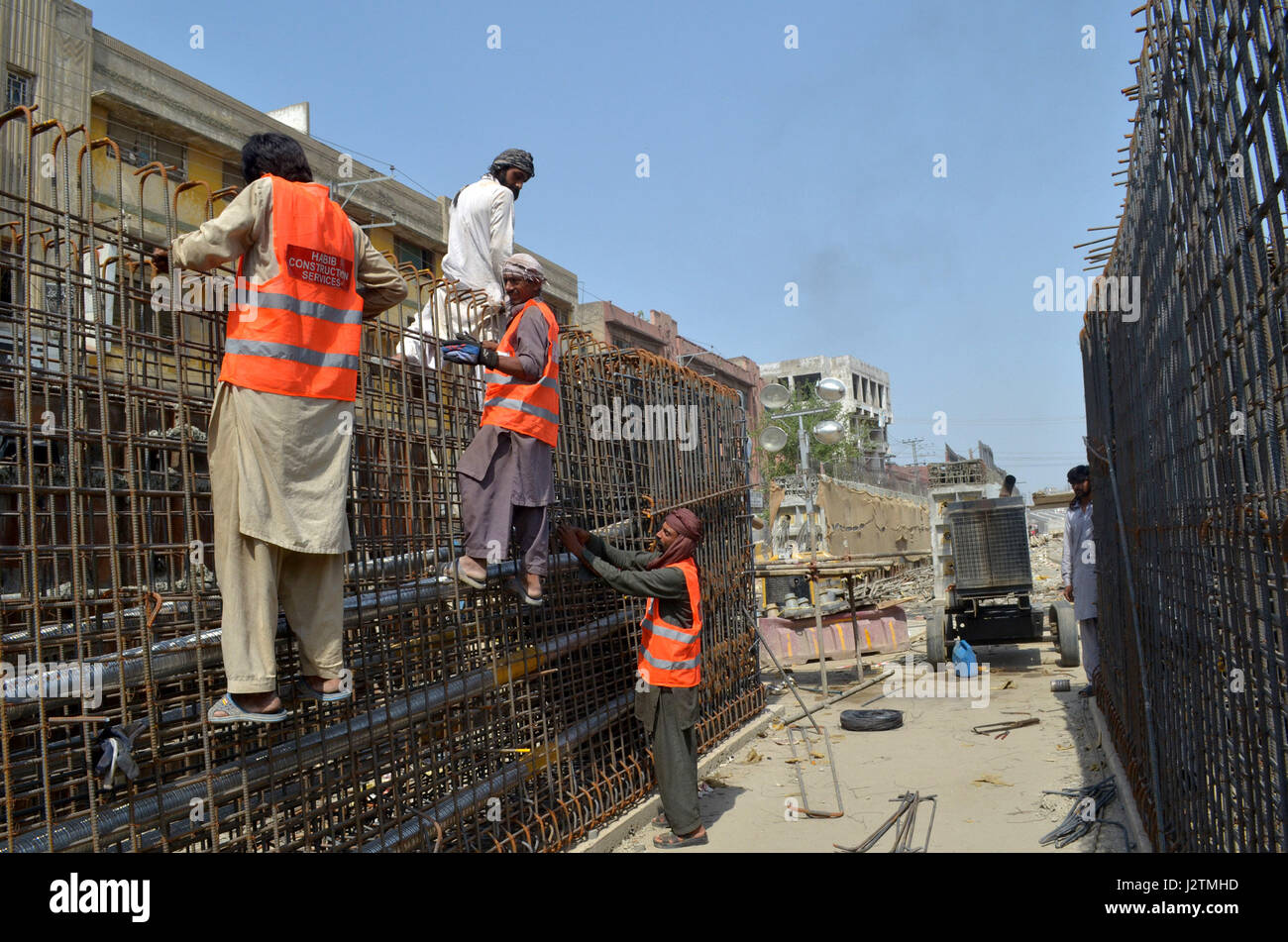 Lahore. 1st May, 2017. Pakistani laborers work at the construction site ...