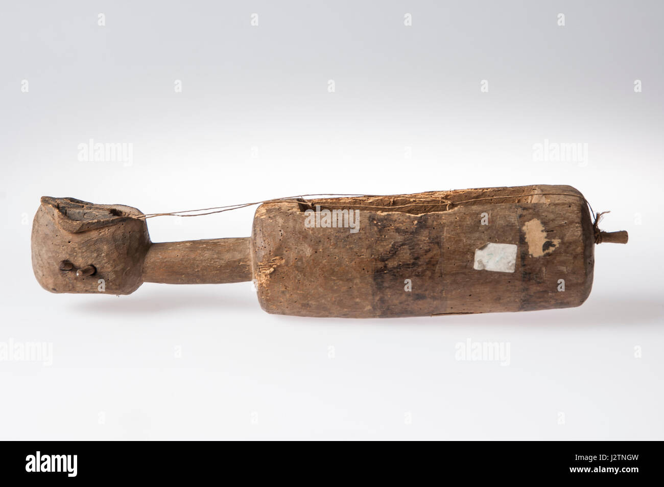 African music instrument with a face, made wooden, isolated on white ...